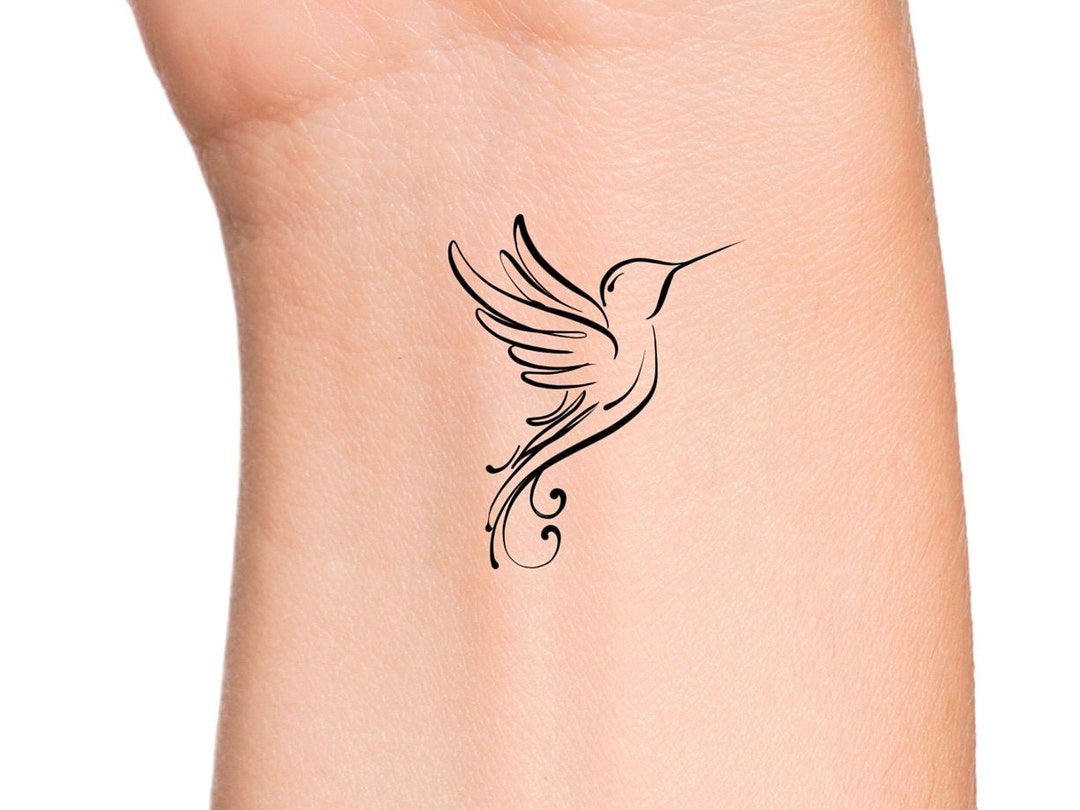 The Timeless Beauty and Symbolism of Hummingbird Tattoos - Tattooed Images